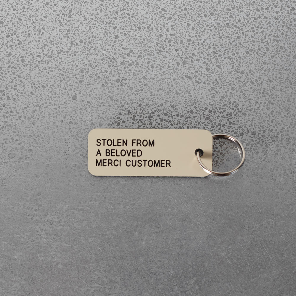 Merci x Various Keytags - "Stolen From a Beloved" Key Chain - Beige